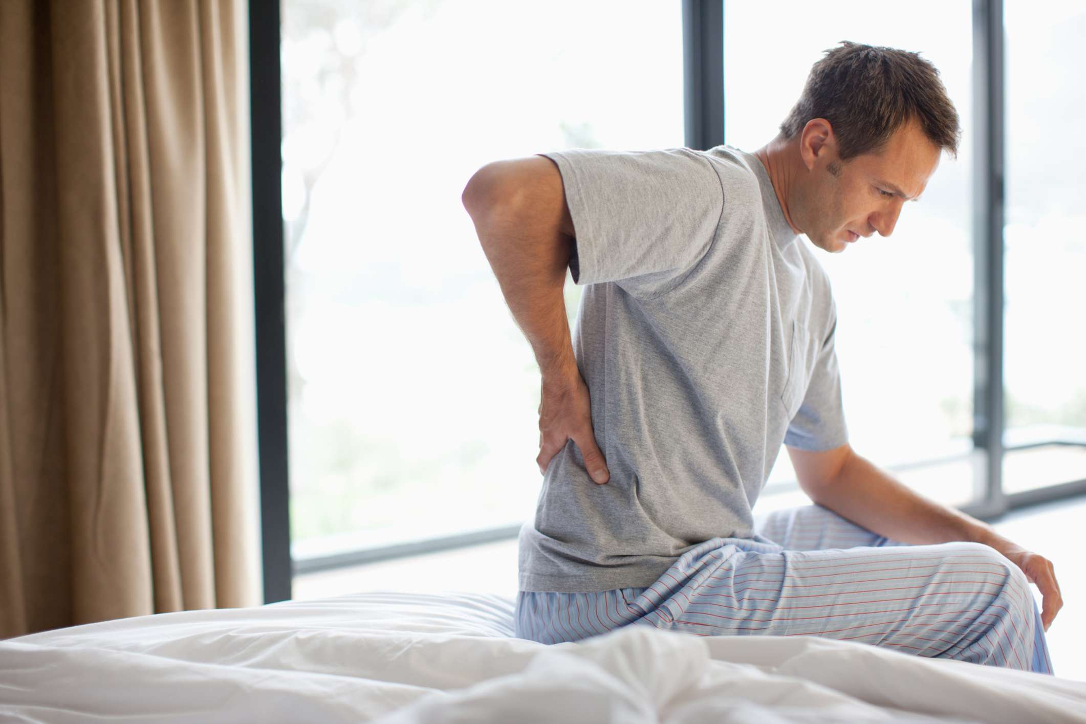What’s causing your stiff back and how can you relieve it?