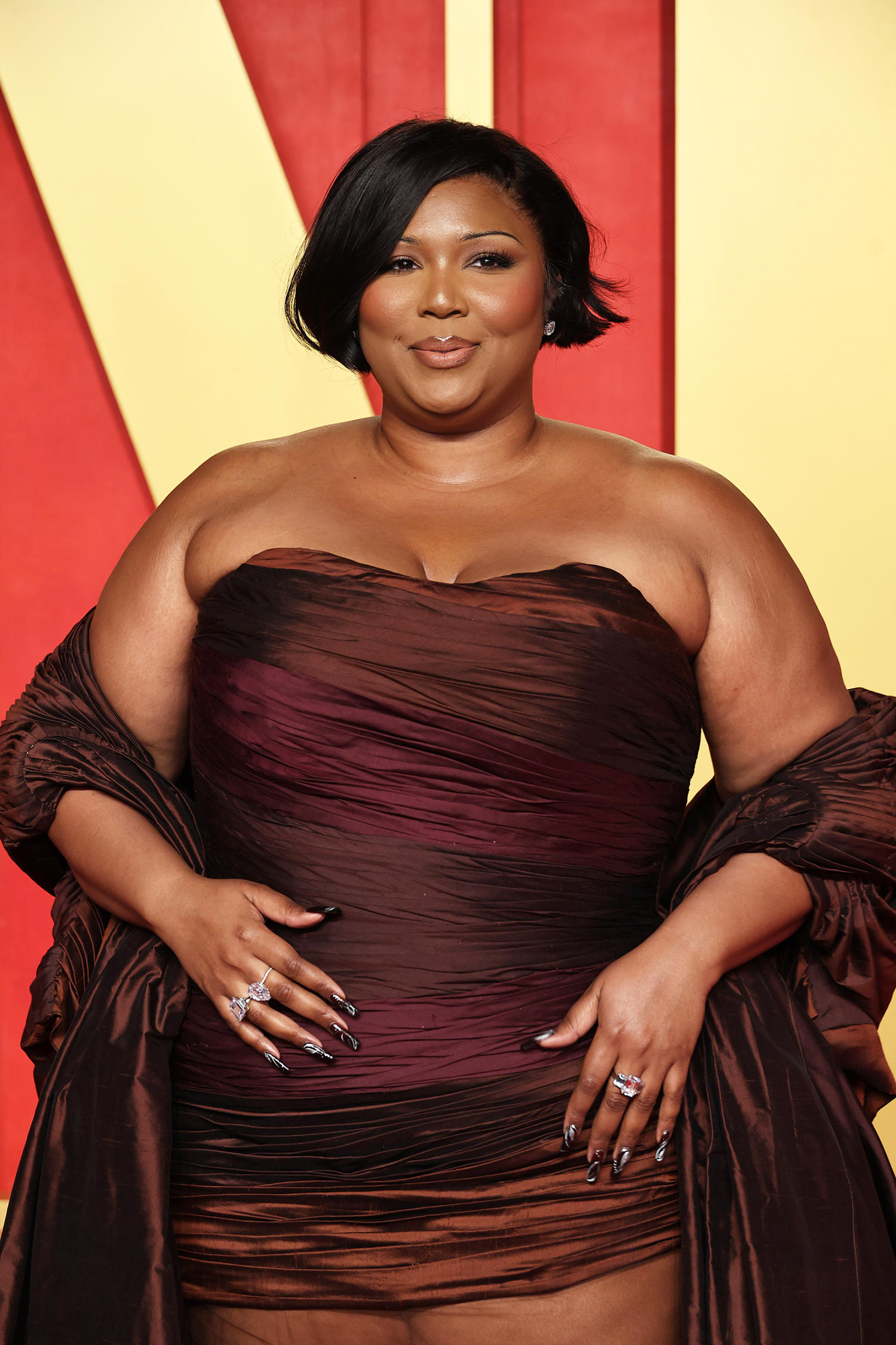 Lizzo celebrates reaching her 'weight release goal.' Everything she's ...