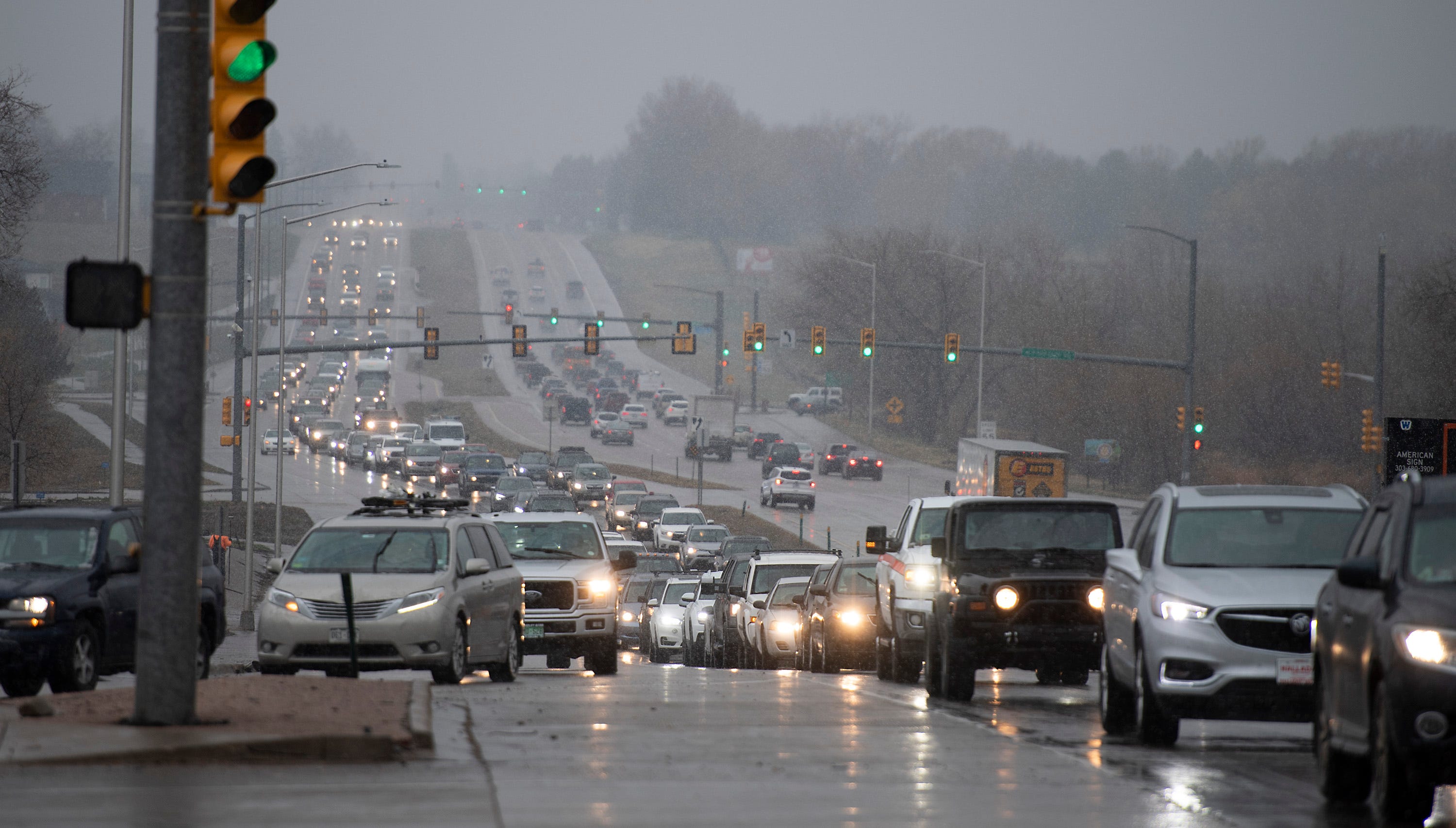 Can I wear earbuds or headphones while driving? What Colorado law says