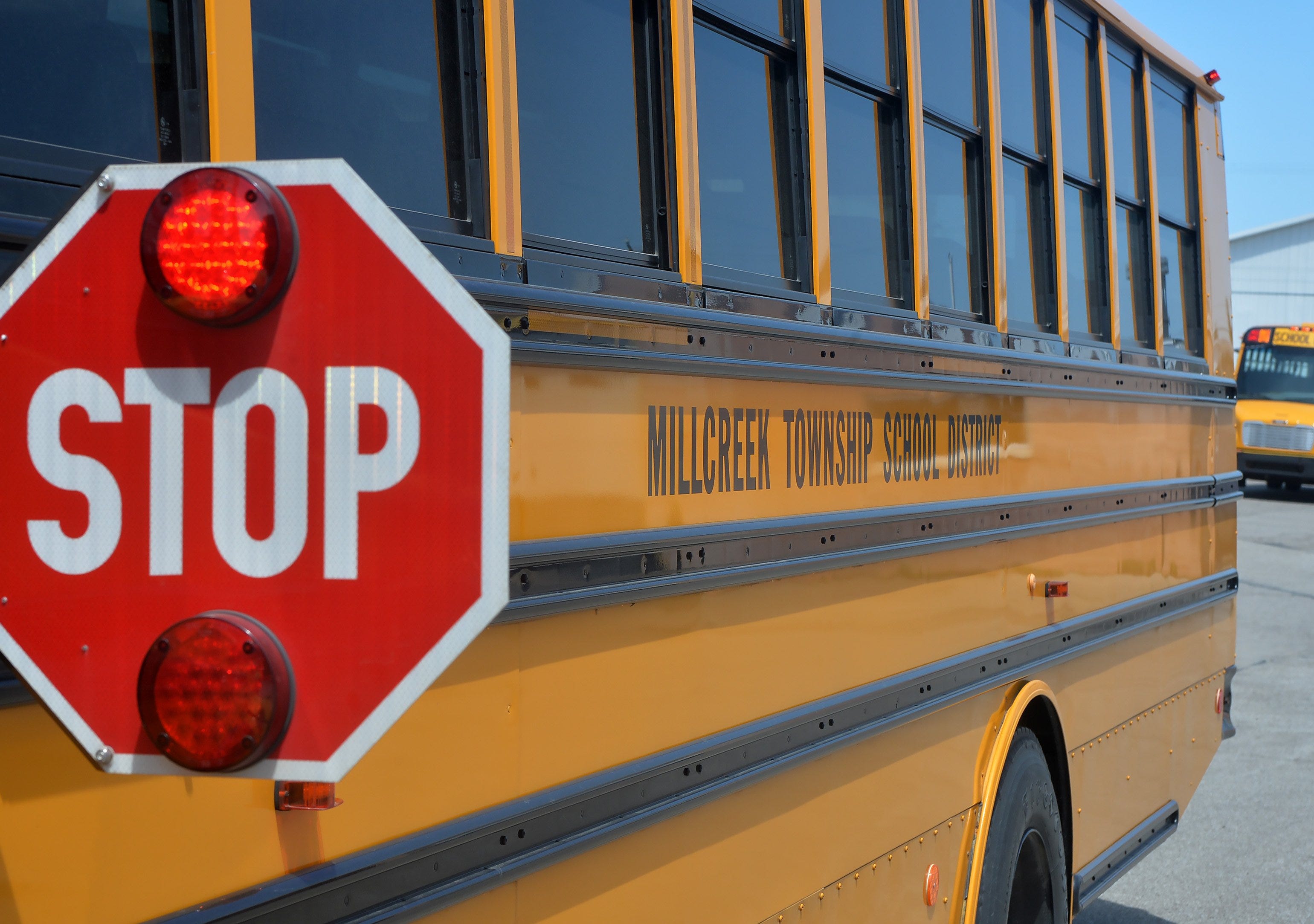 Cameras, AI, harsh fines. Officials grapple with school bus safety