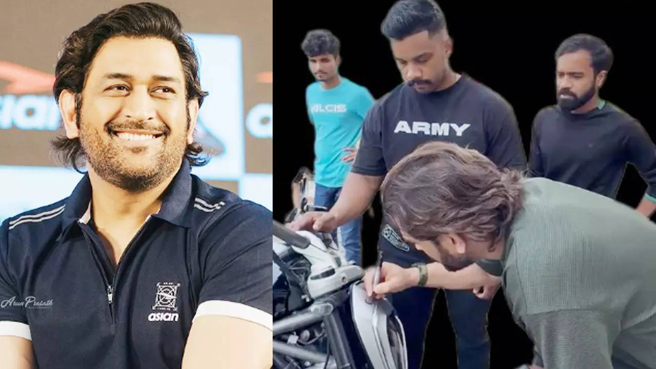 MS Dhoni wins hearts again, signs fan's bike in a heartwarming gesture ... MS Dhoni wins hearts again, signs fan's bike in a heartwarming gesture ...