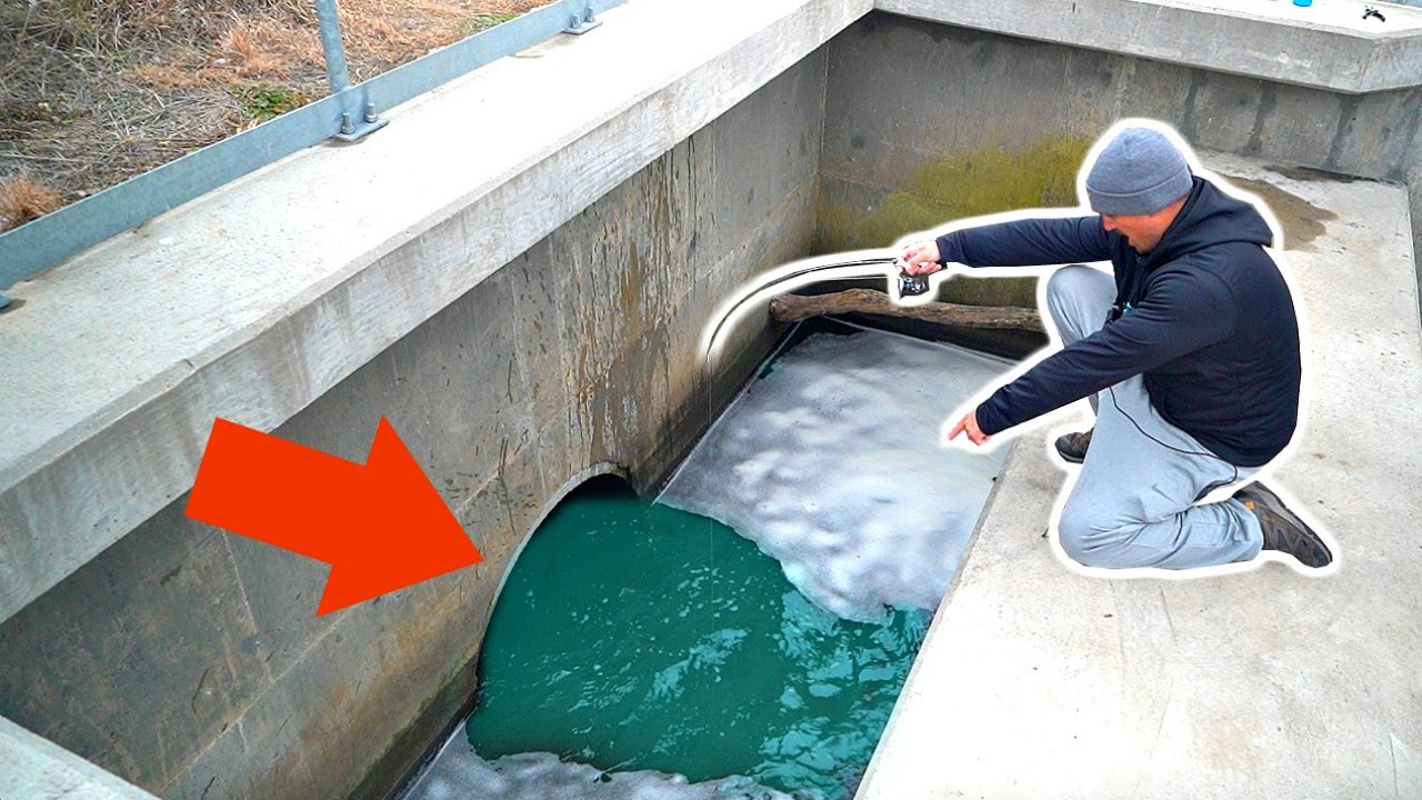Surprise catch fishing an icy drain in freezing water