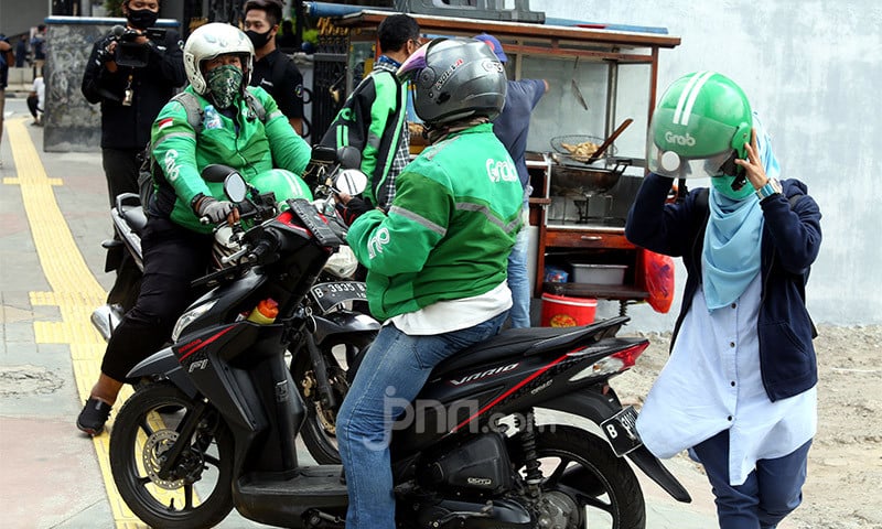 Pemerintah Usahakan Driver Ojek Online Terima THR Lebaran 2025