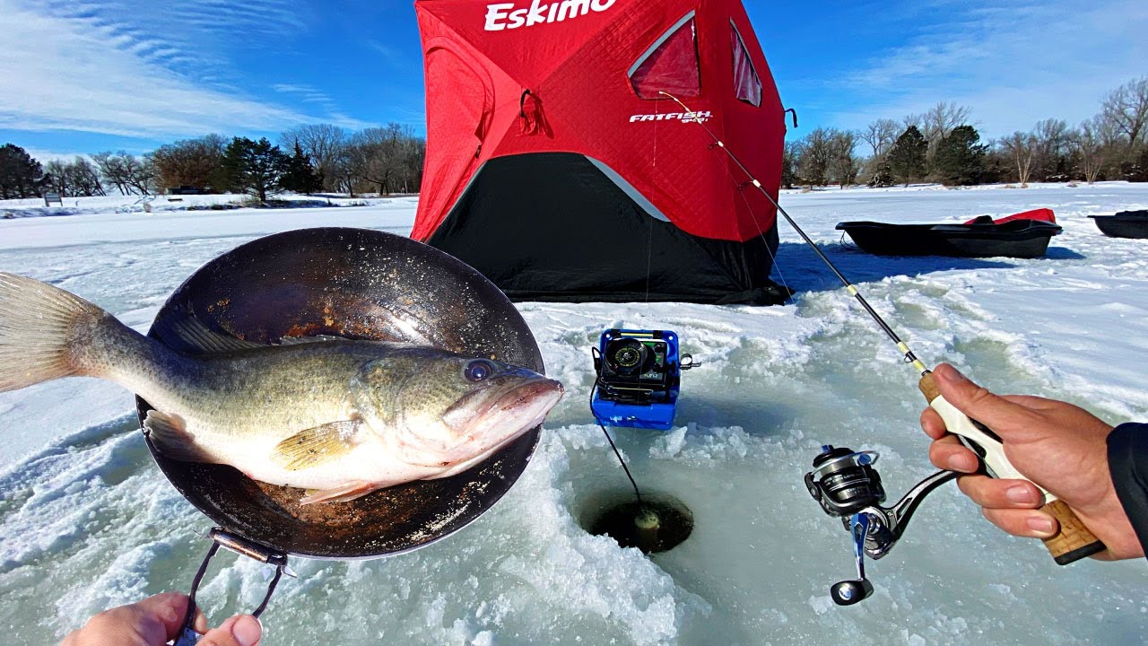 Pond bass catch and cook during ice fishing adventure