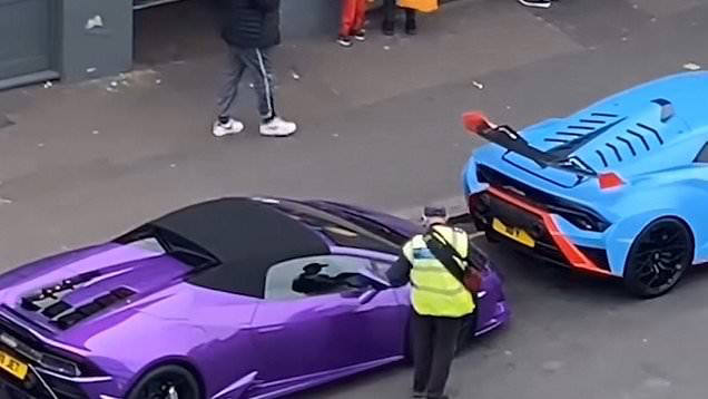 Illegally parked supercars get ticketed outside Nando's Illegally parked supercars get ticketed outside Nando's