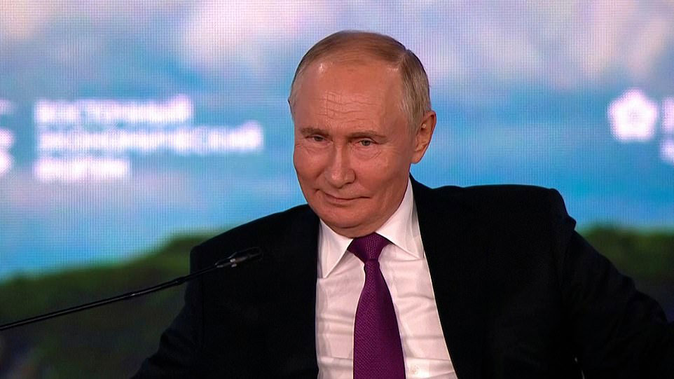 Smirking Vladimir Putin reveals who he's supporting in the US election Smirking Vladimir Putin reveals who he's supporting in the US election