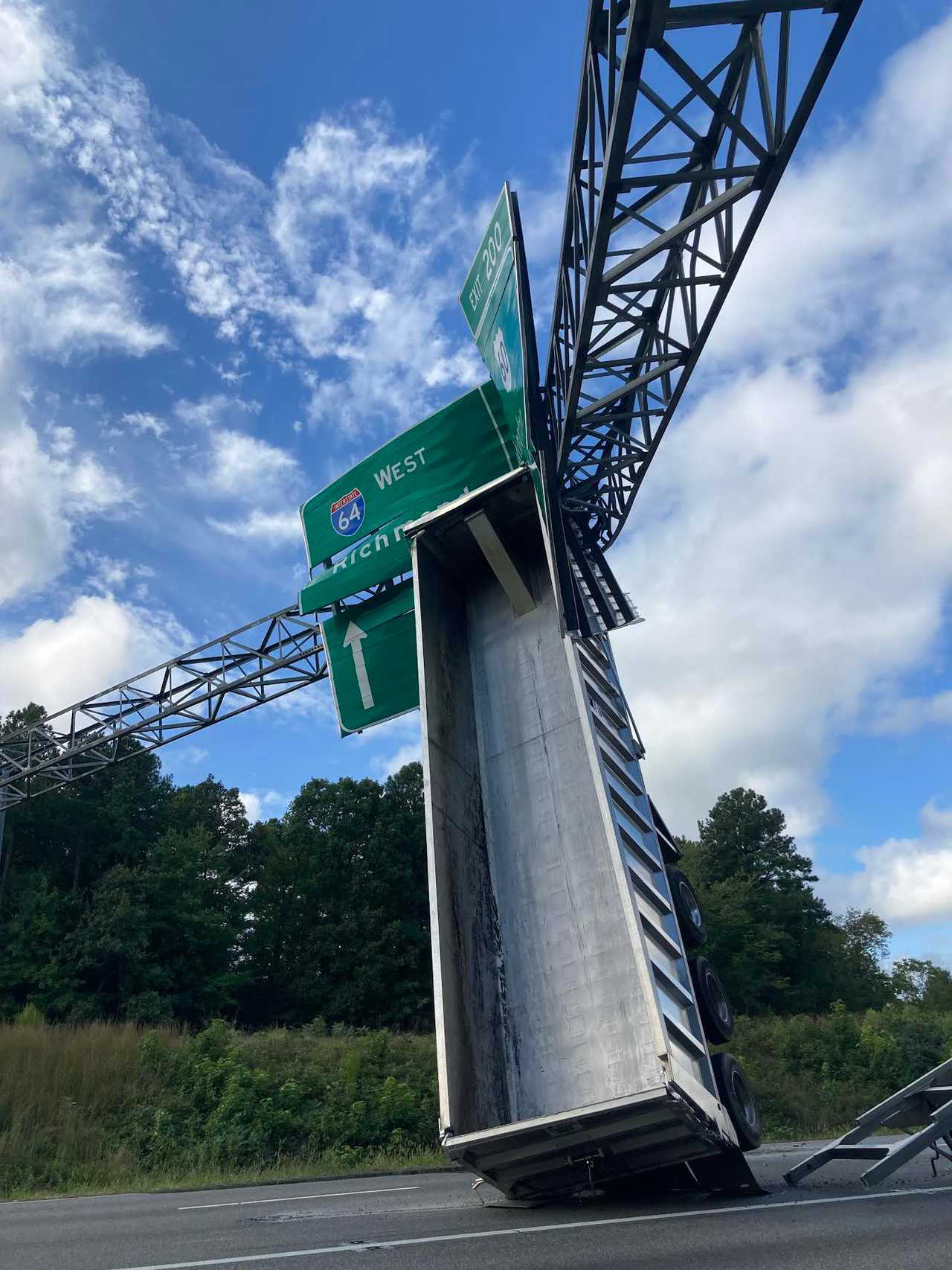 Tractor-Trailer Driver Charged After Smashing Through I-64 Sign ... Tractor-Trailer Driver Charged After Smashing Through I-64 Sign ...