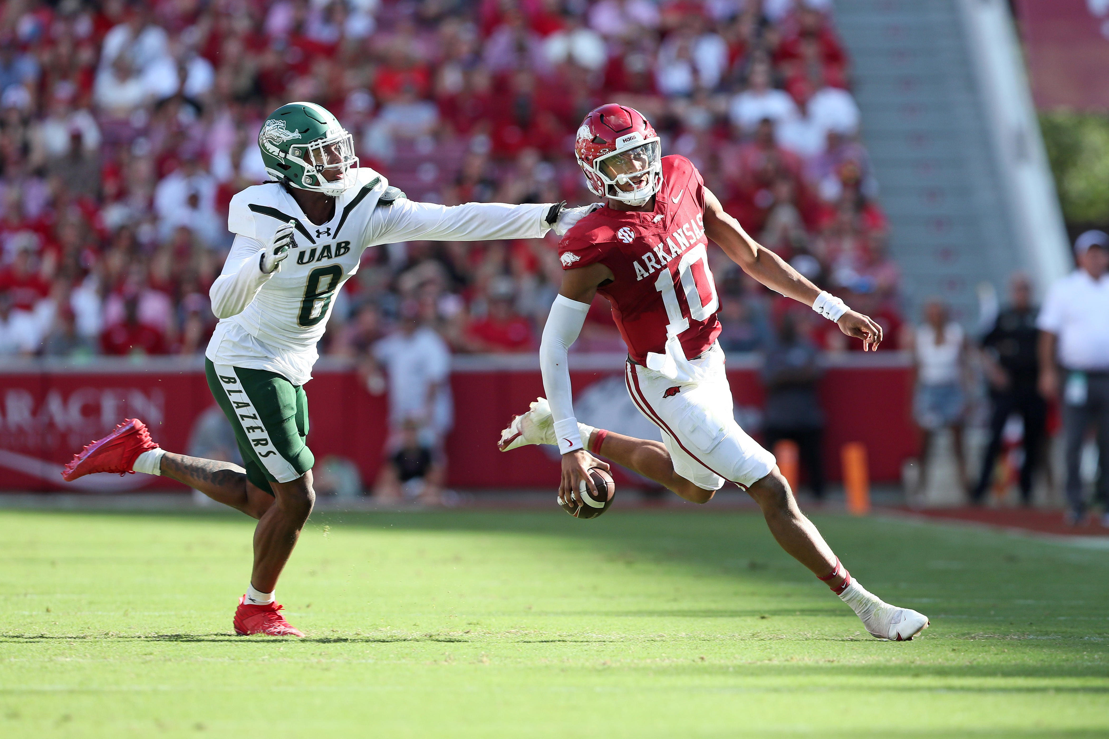 Is Arkansas ranked in preseason college football Coaches Poll?