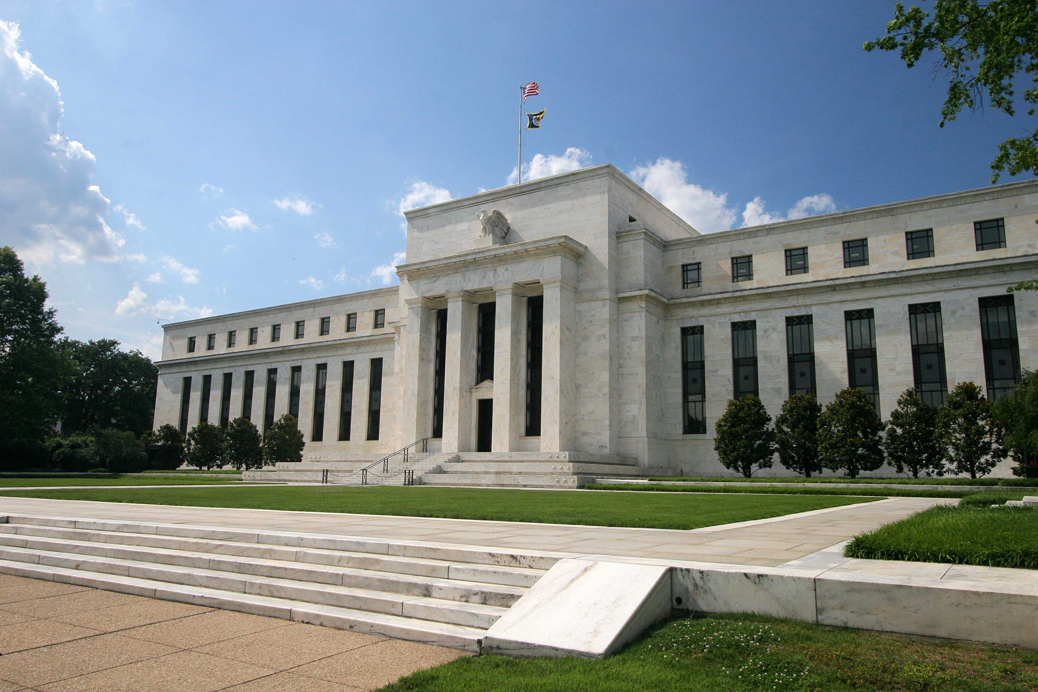 Federal Reserve holds interest rates steady amid political scrutiny