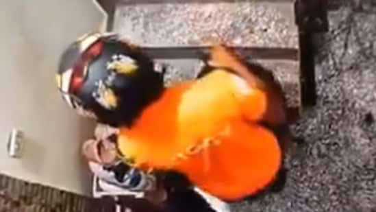 Caught on CCTV: Swiggy delivery agent steals shoes left outside Noida ... Caught on CCTV: Swiggy delivery agent steals shoes left outside Noida ...