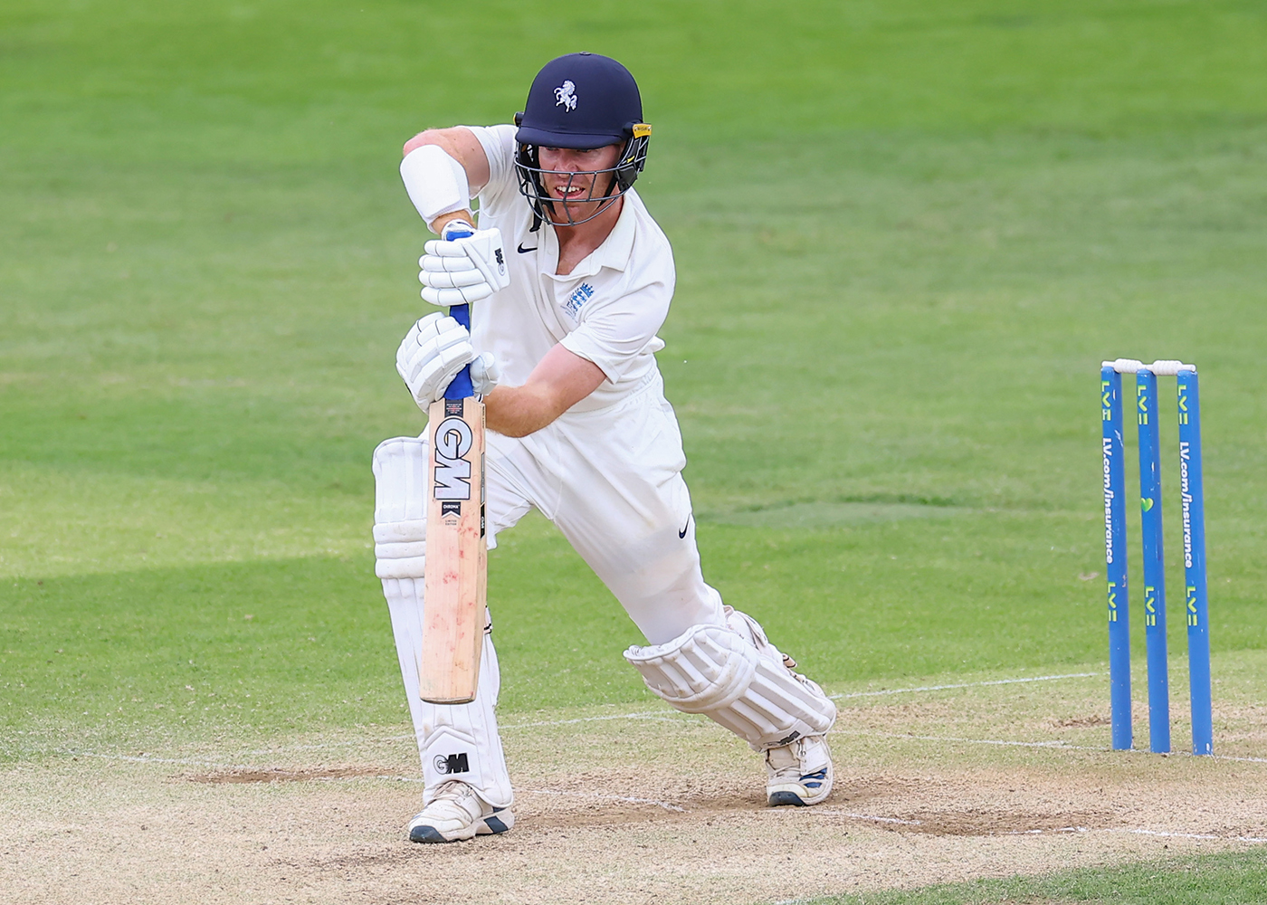Rain halts Gloucestershire's progress after Ben Compton's defiance