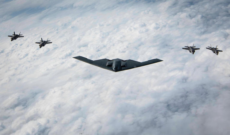 Photos show a US Air Force B-2 Spirit bomber flying with Japanese F-35s ...