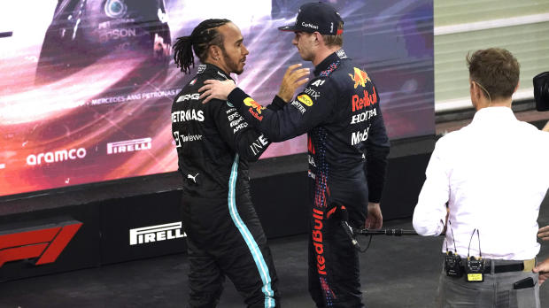 F1 Hungarian Grand Prix: Lewis Hamilton forced off track after tense Max Verstappen fight