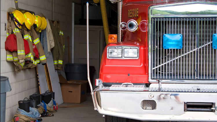 2 Clinton firefighters injured while responding to garage fire
