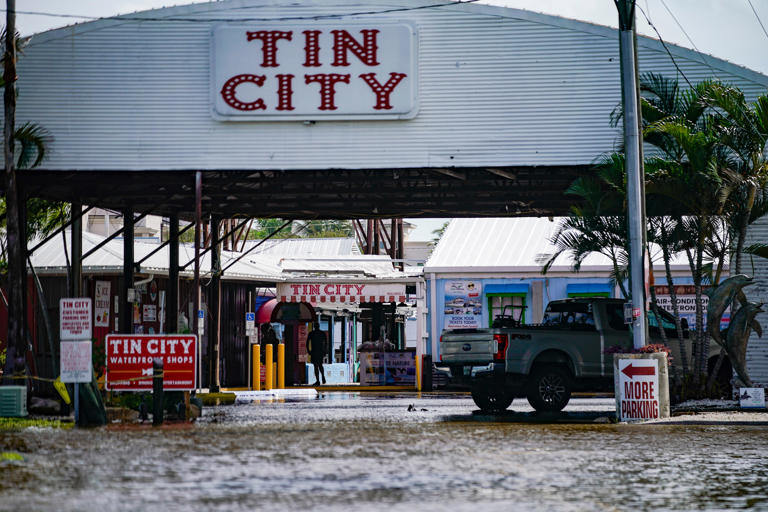VIDEO: Flooding at Tin City in Naples on Thursday before Hurricane ...
