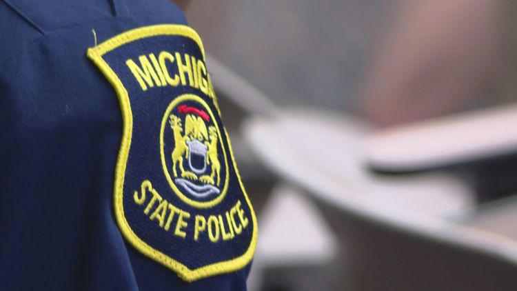 Michigan State Police investigating after body found in wooded area ...