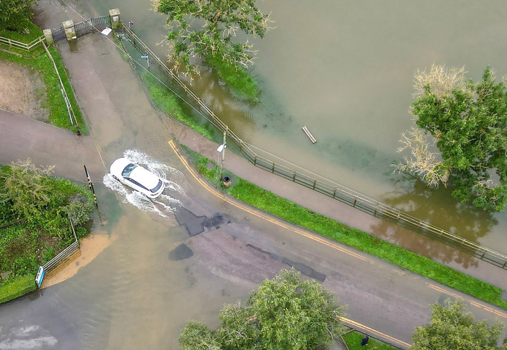 Dozens of flood warnings issued across England as heavy rain swells rivers Dozens of flood warnings issued across England as heavy rain swells rivers