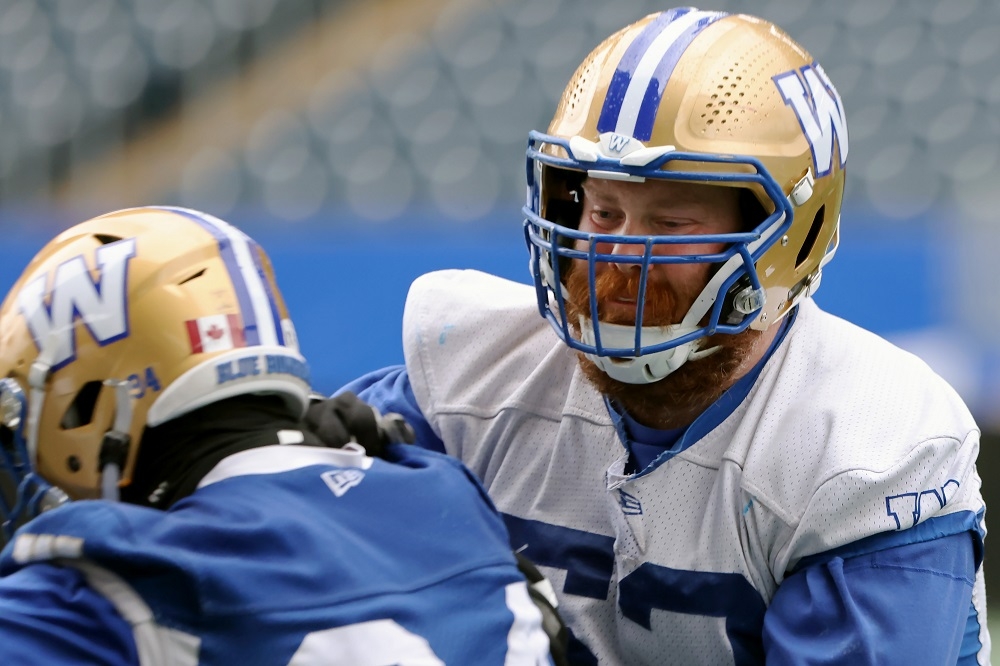 This hog not done yet: Neufeld digs in for another year with Bombers