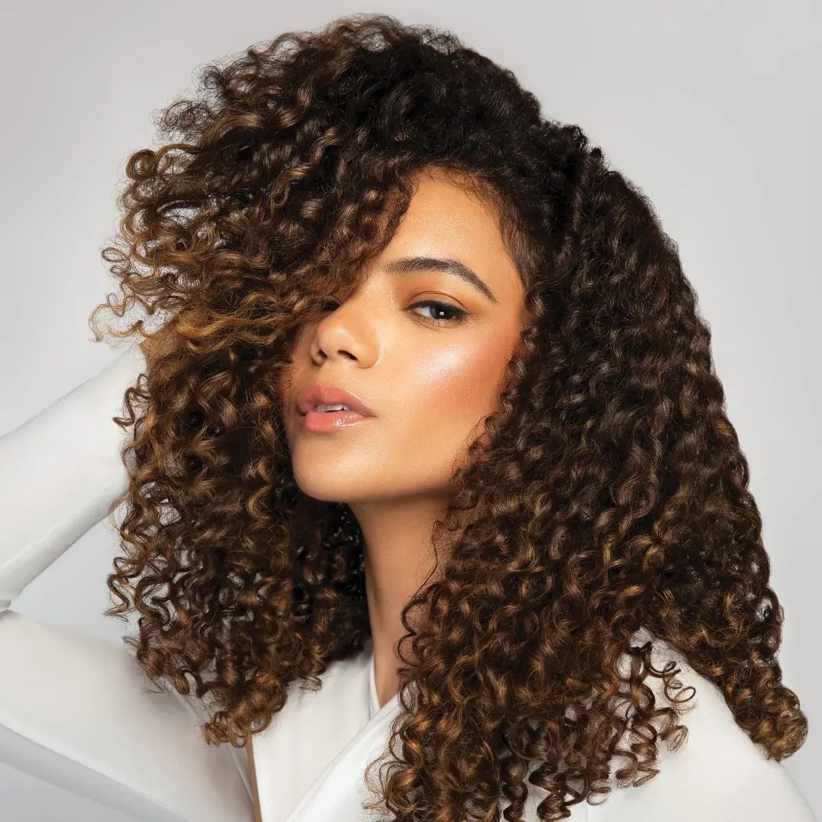 8 Leave-In Conditioners For Silky, Smooth, & Strong Curly Hair