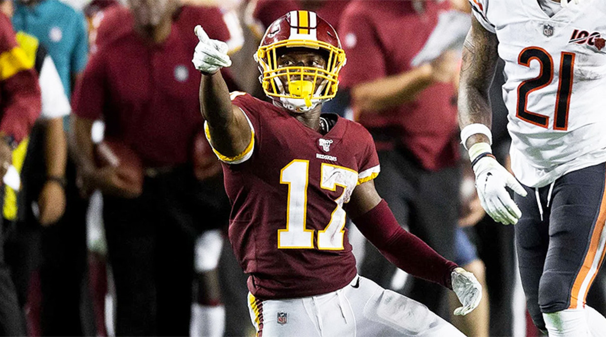 Star Reciever Joins Commanders Legends in Thrilling Victory