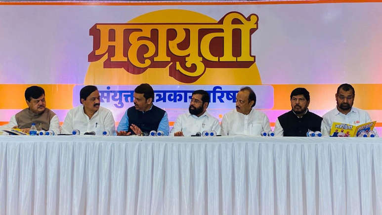 In Photos Eknath Shinde Devendra Fadnavis Ajit Pawar release report ... In Photos Eknath Shinde Devendra Fadnavis Ajit Pawar release report ...