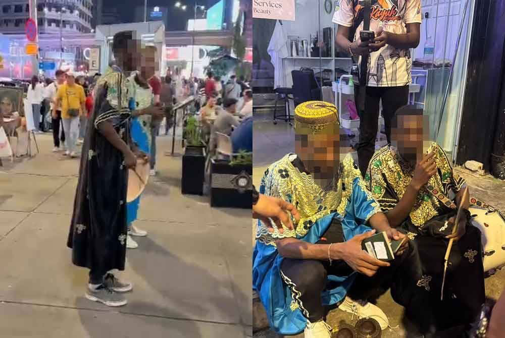 Two foreign tourists nabbed for singing and begging in Bukit Bintang Two foreign tourists nabbed for singing and begging in Bukit Bintang