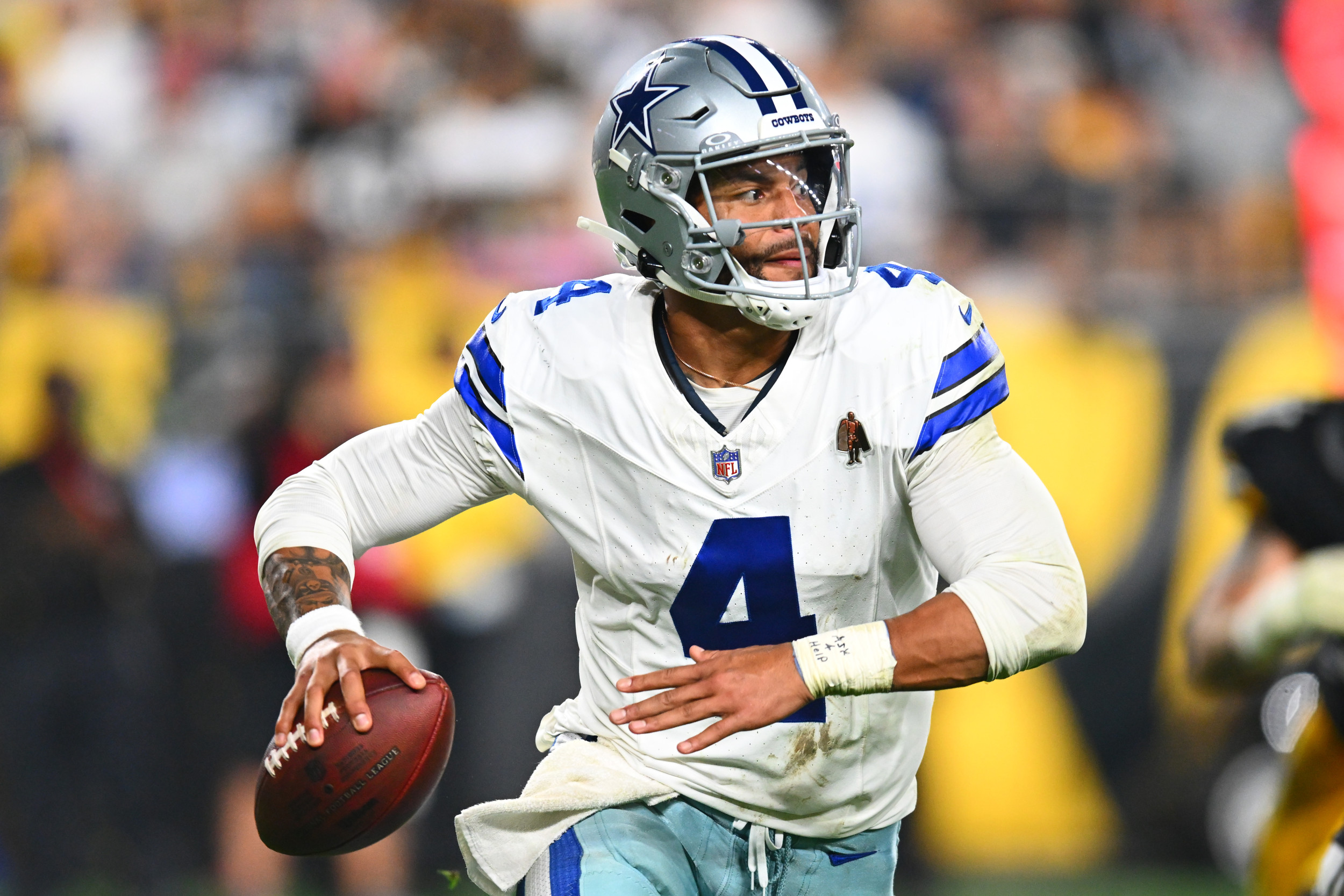 Former Champion Sets High Bar For New-Look Cowboys Offense