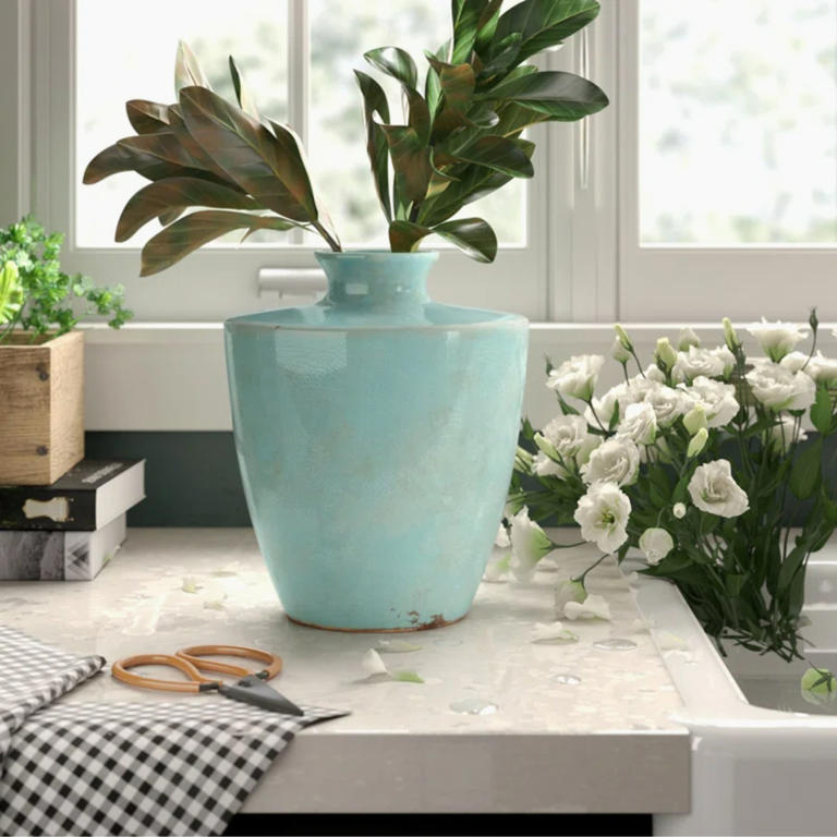 Anne Hathaway’s seafoam kitchen cabinets are a study in softer hues ...
