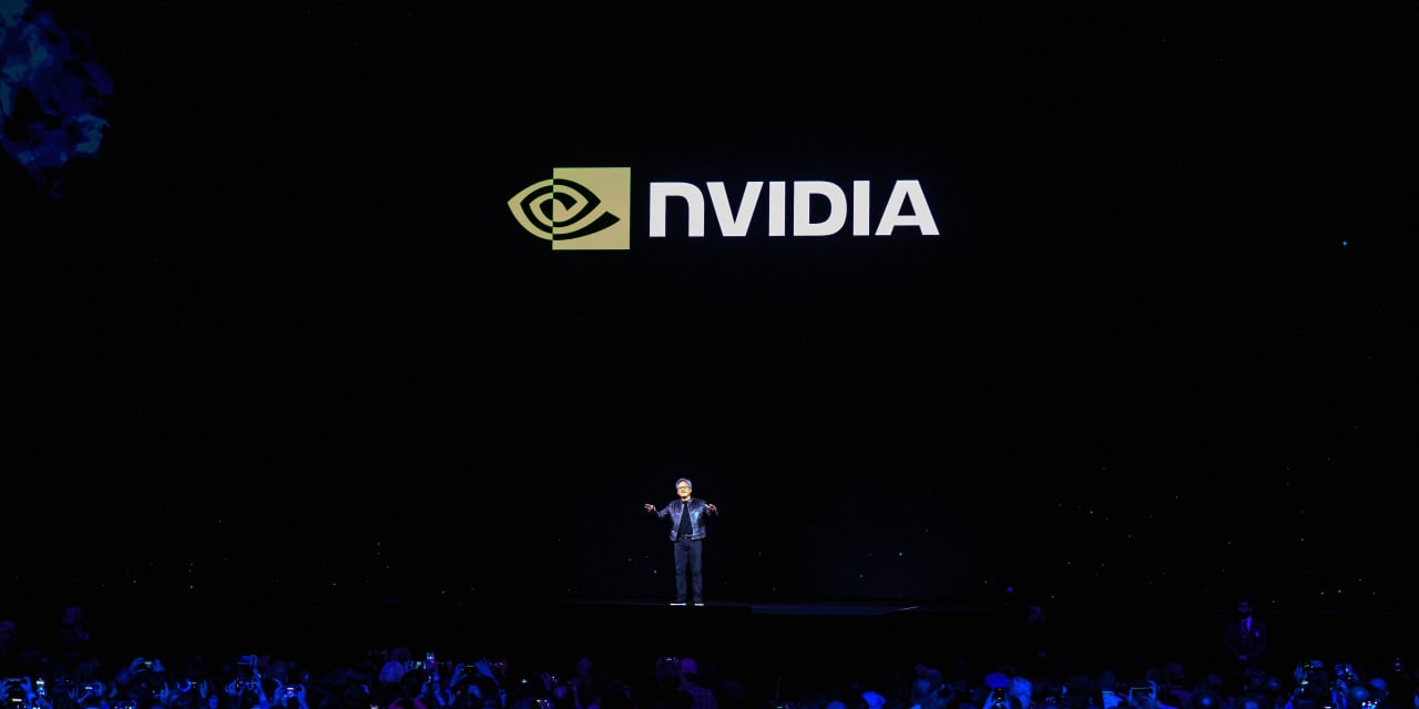 Nvidia’s stock joins the Dow today. Here’s what to know.