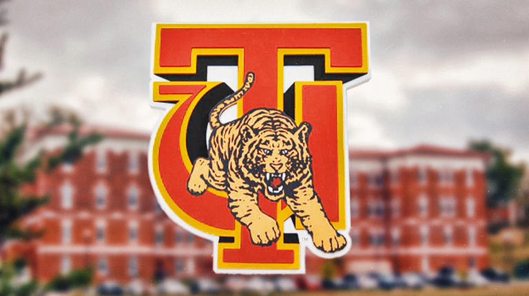 Tuskegee University player pushes Alabama State band member during halftime