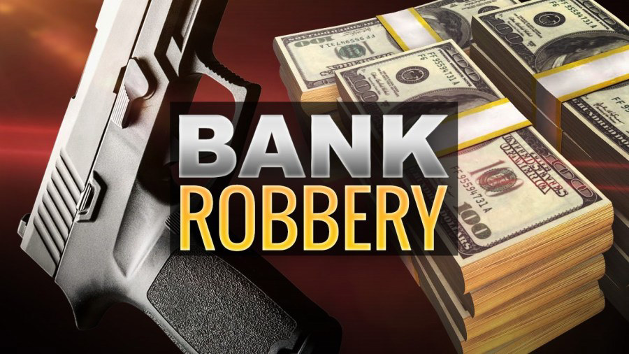 Police hunt suspect in Beloit bank robbery Police hunt suspect in Beloit bank robbery
