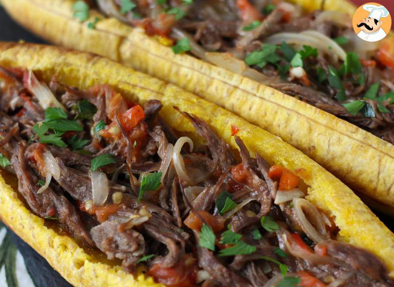 Plantains stuffed with shredded meat and grated cheese
