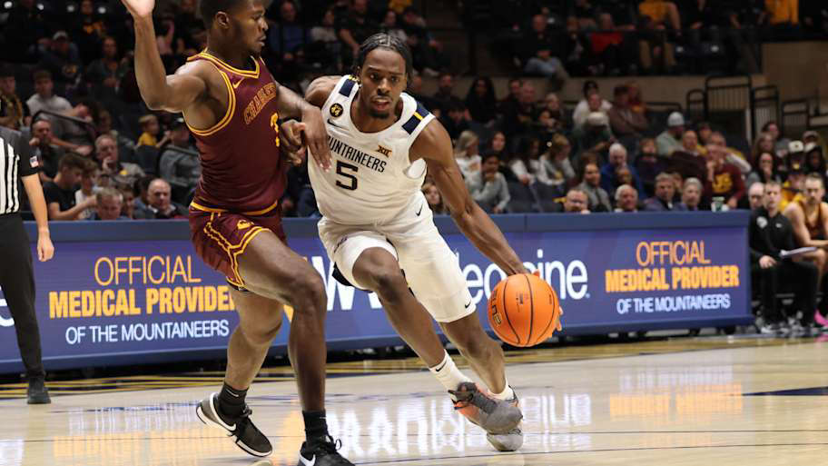 Toby Okani Throws Down Vicious Alley-Oop During WVU's Season Opening Win Toby Okani Throws Down Vicious Alley-Oop During WVU's Season Opening Win