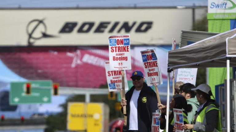 Boeing machinists vote to end strike after 53 days Boeing machinists vote to end strike after 53 days