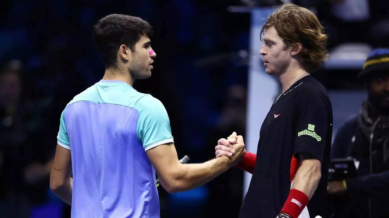 Carlos Alcaraz overcomes illness to defeat Andrey Rublev at ATP Finals Carlos Alcaraz overcomes illness to defeat Andrey Rublev at ATP Finals