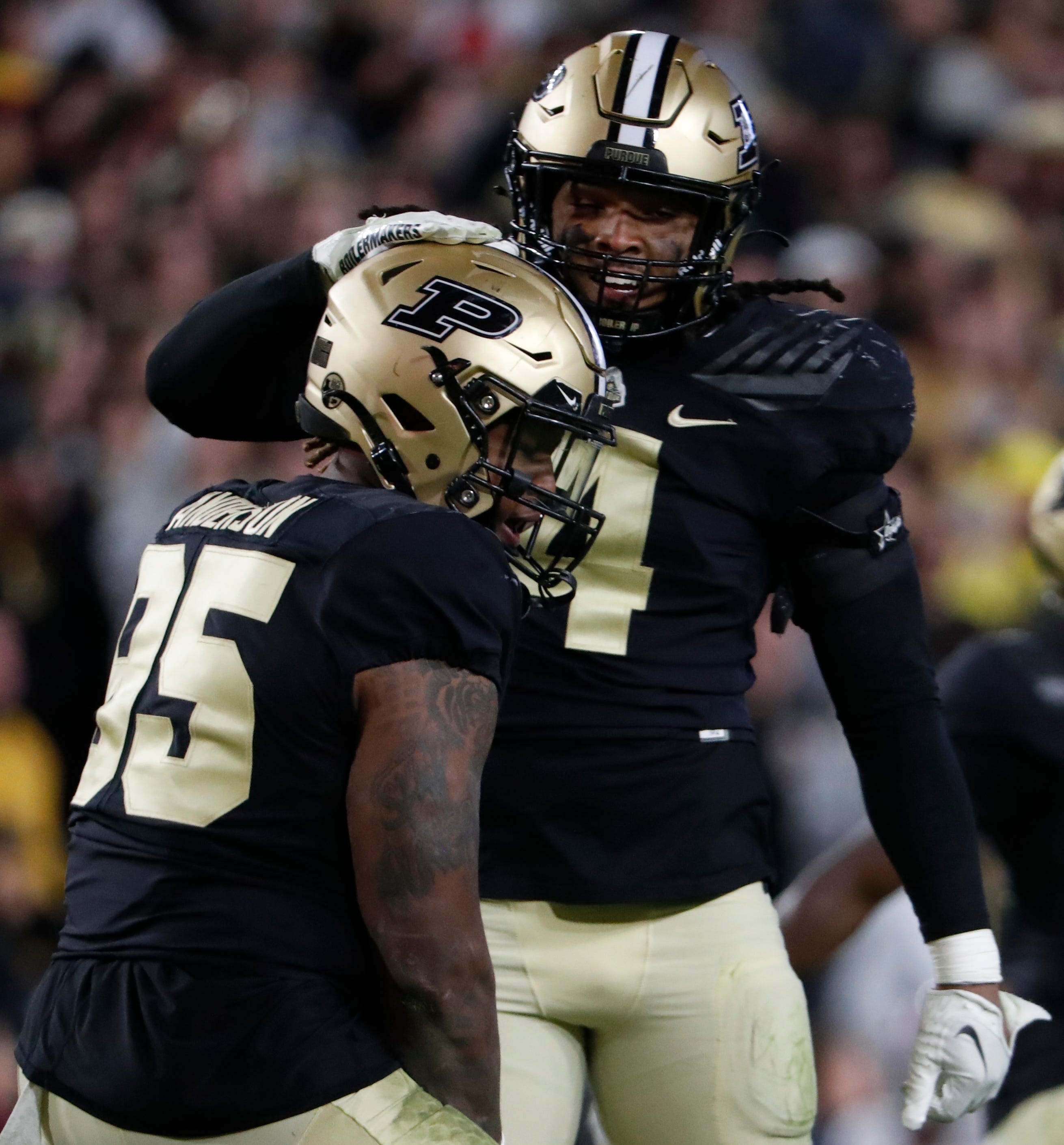 Which Purdue football players will participate in Pro Day?