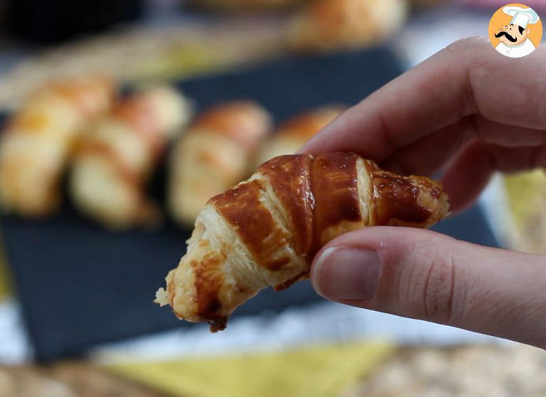 Puff pastry croissants with bechamel, ham, and cheese