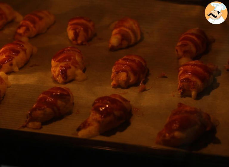 Puff pastry croissants with bechamel, ham, and cheese