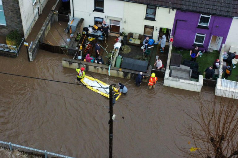 People bail out flooded homes in Pontypridd with bins in 'utterly heart ...