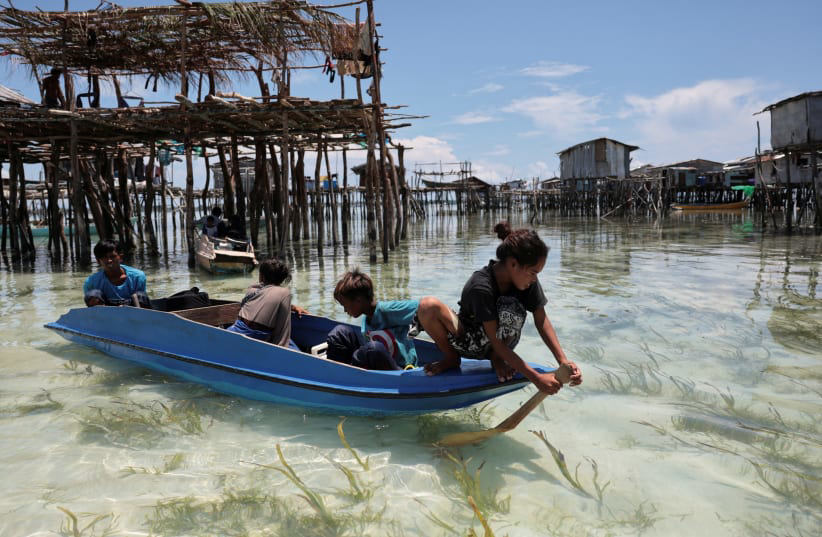 Overfishing and climate change force indigenous Malay populations to ... Overfishing and climate change force indigenous Malay populations to ...