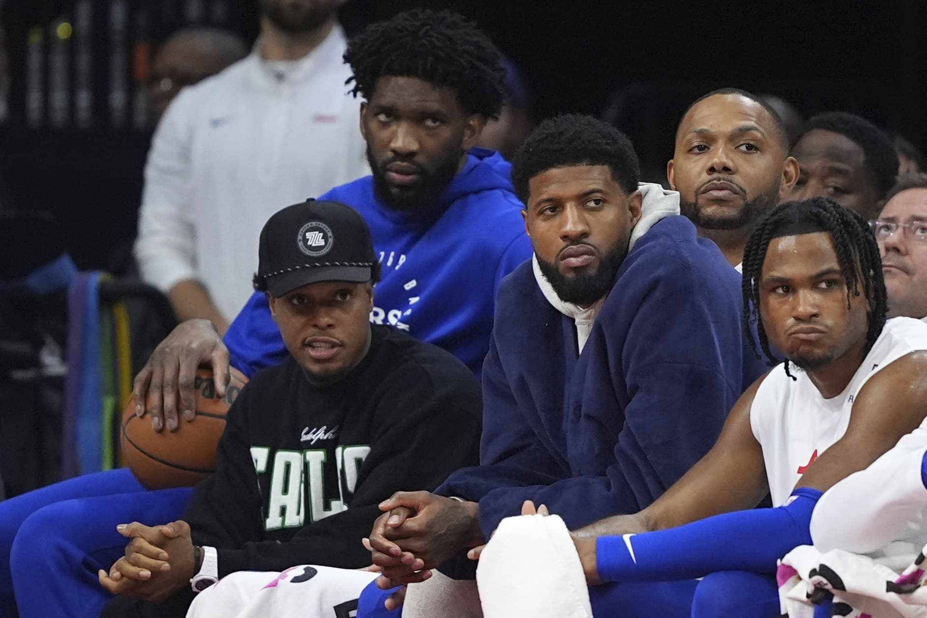 NBA: Injured Embiid, Paul George watch from 76ers’ bench again
