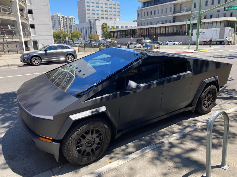 Cybertruck crash report says witness could not open door to save victims