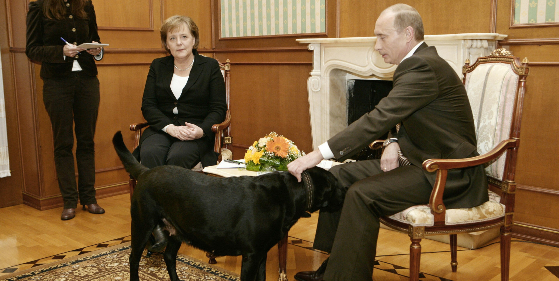 Putin denies intimidating Angela Merkel with his dog