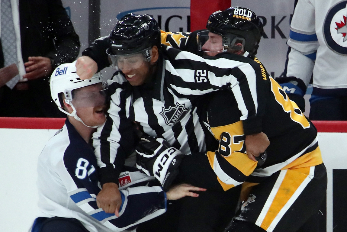 Our top hockey fight photos from the 2024-25 season, so far