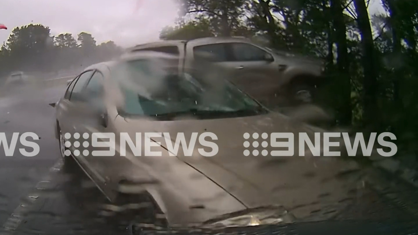 'Out of a movie': Dashcam captures wet weather crash on major freeway 'Out of a movie': Dashcam captures wet weather crash on major freeway