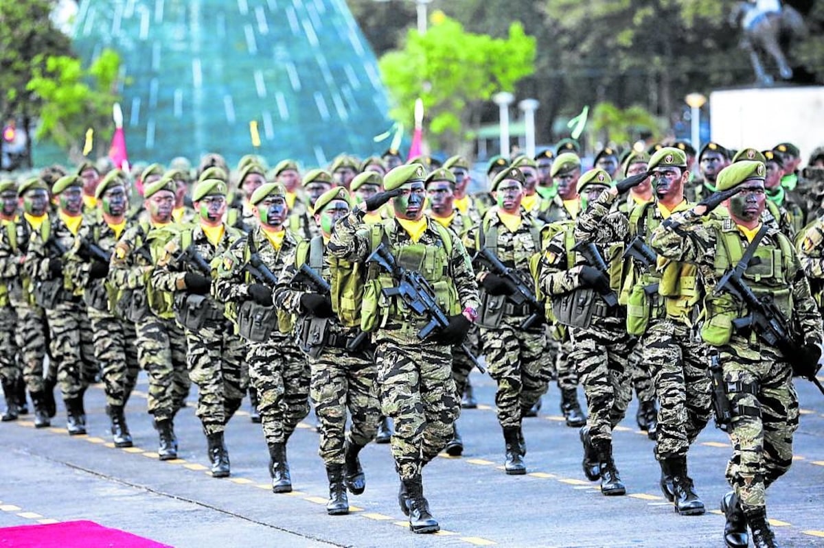 Marcos announces base pay hike for military, uniformed personnel