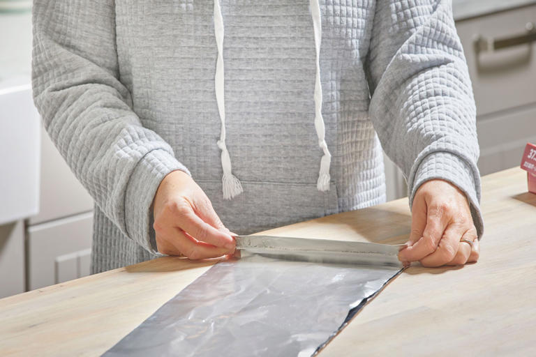This Clever Aluminum Foil Hack Can Keep a Very Dirty Part of Your Kitchen Clean