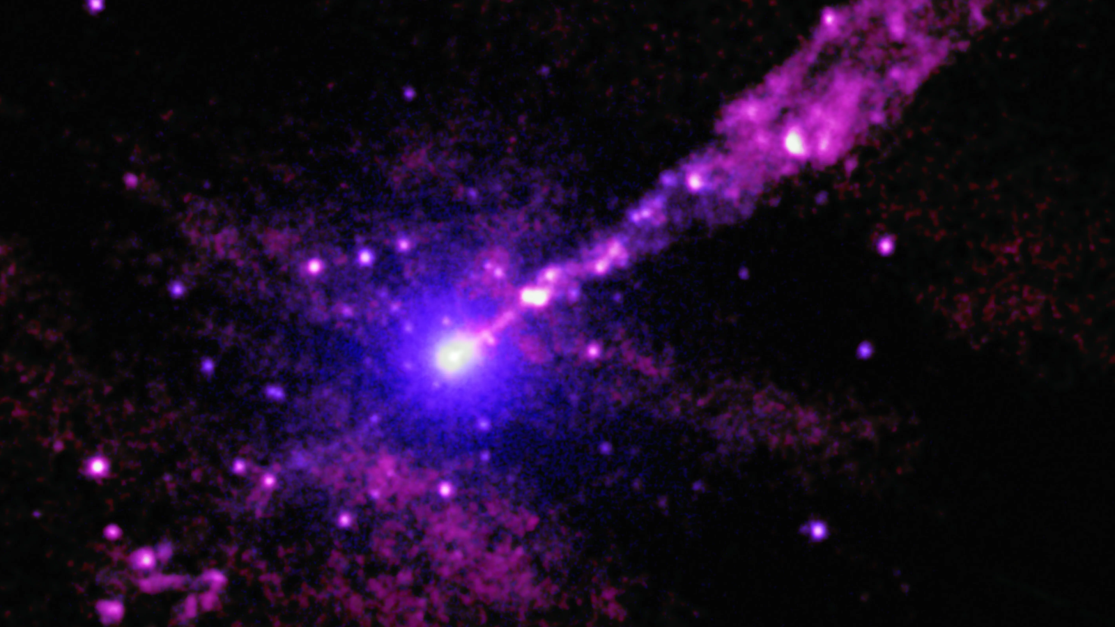 Galaxy-size jet from monster black hole blasts mystery object in deep ...