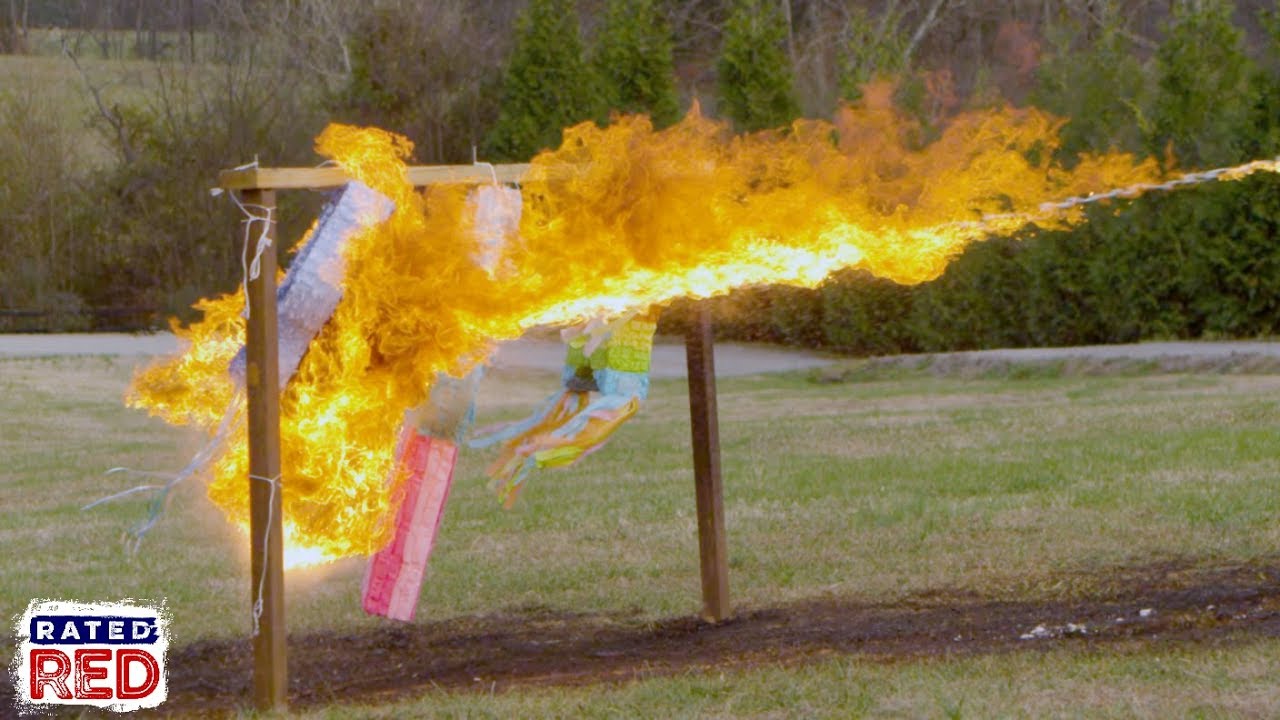 Watch—These Piñatas Are No Match for Our Epic Flamethrower