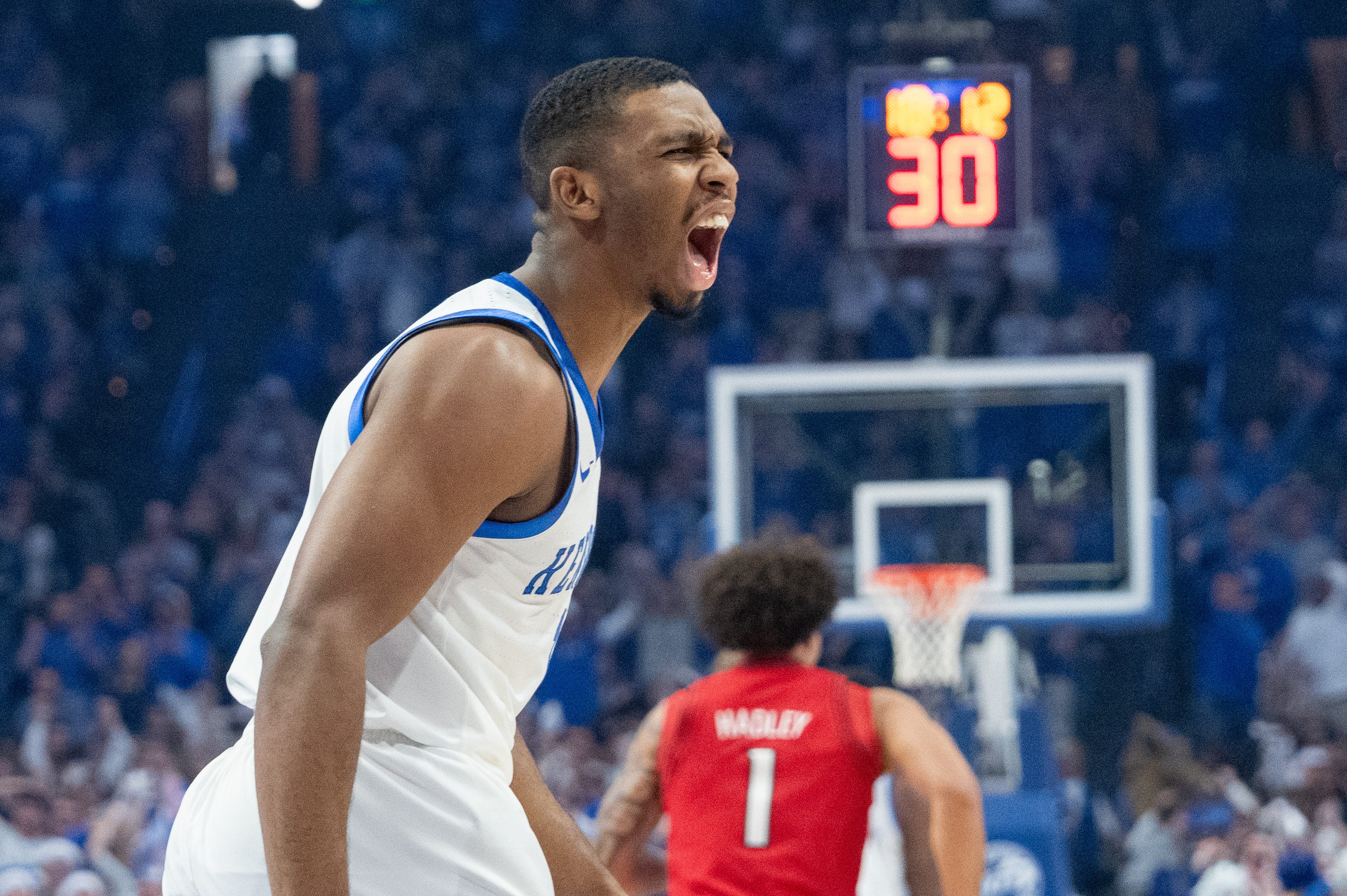 Lamont Butler lifts Kentucky basketball to win over Louisville in ...